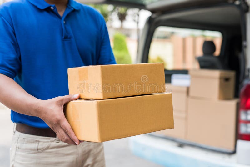 Blue Delivery Man Holding Parcel Card Box. Stock Photo - Image of home ...