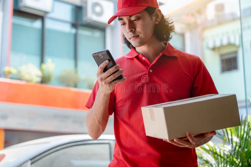 Delivery Man Looking Customer Address in Mobile Application. Selective ...