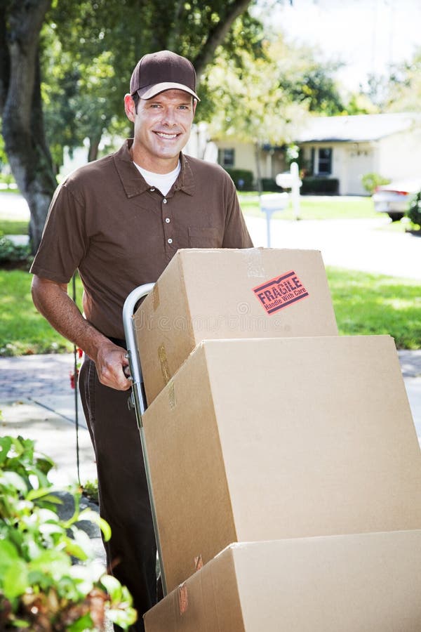 Handsome Delivery Man or Mover Stock Photo - Image of fragile, mover ...