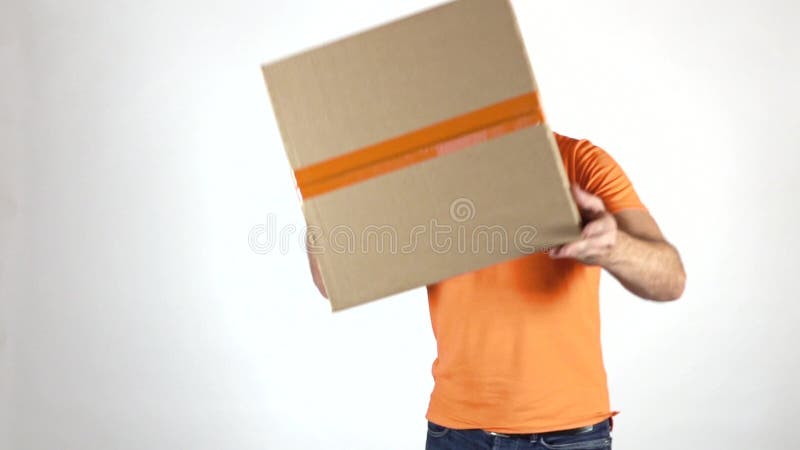 Delivery Man in Orange Uniform Delivering Two Big Cartons. Light Gray ...