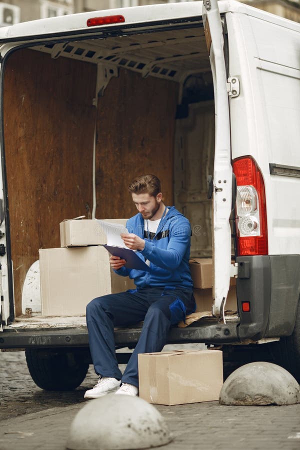 Delivery Man with Package Outdoors Stock Image - Image of delivery ...
