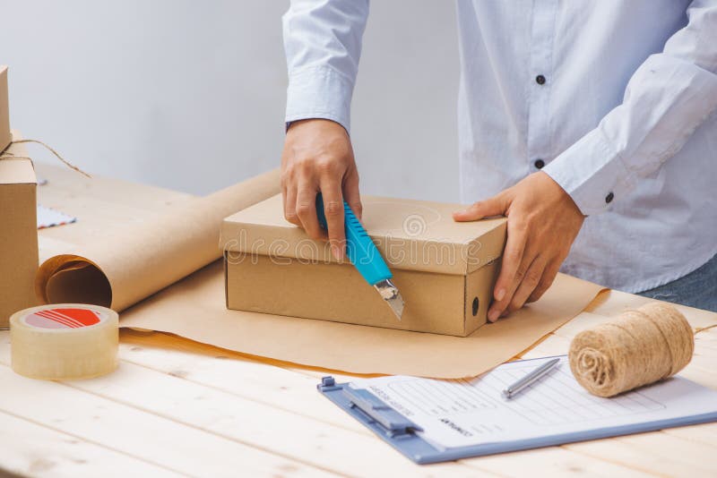 Delivery Man Packing Up on Work Place in Post Office Stock Image ...