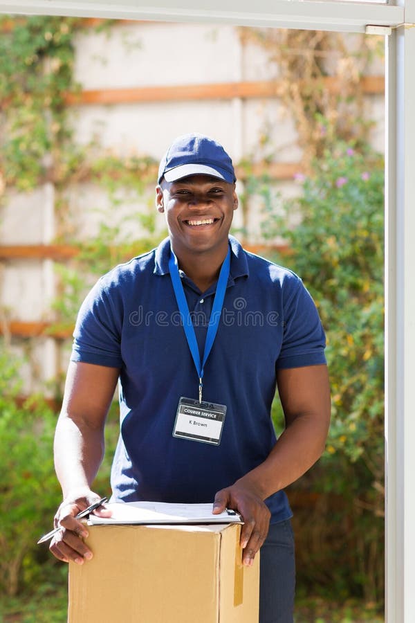 African delivery man stock photo. Image of carton, holding - 29097174
