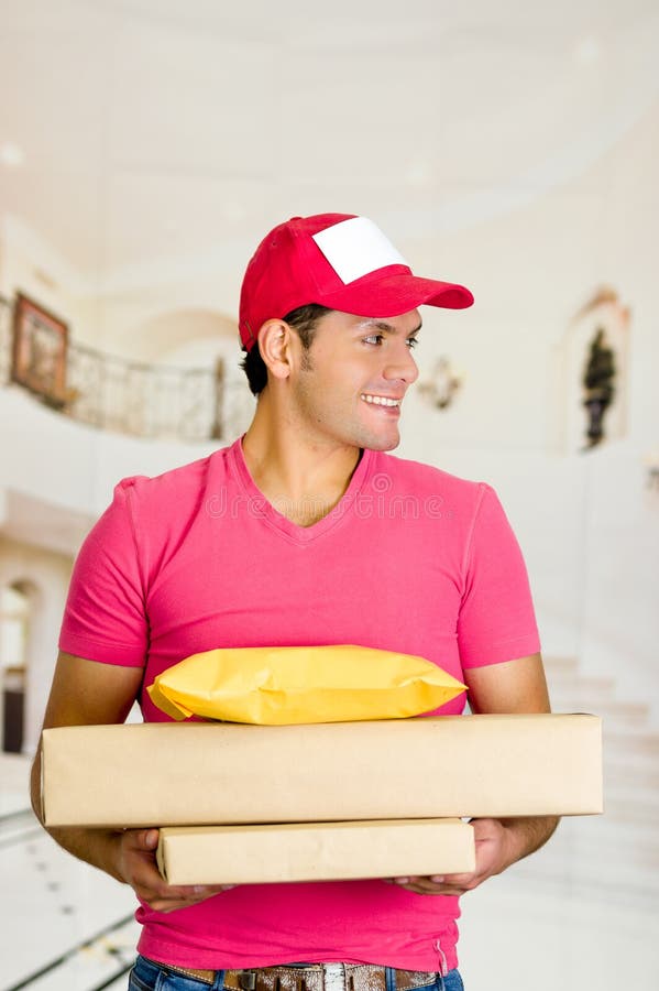 Delivery Man in Pink Uniform Holding Boxes and Documents. Stock Photo ...