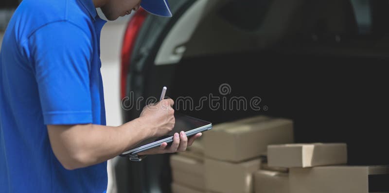 Delivery Man Preparing Parcel Box To Customer while Checking Orders on ...