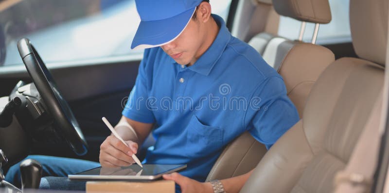 Delivery Man Preparing Parcel Box To Customer while Checking Orders on ...