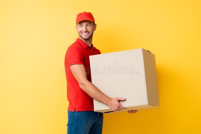 Delivery Man in Red Cap Holding Stock Photo - Image of profession ...