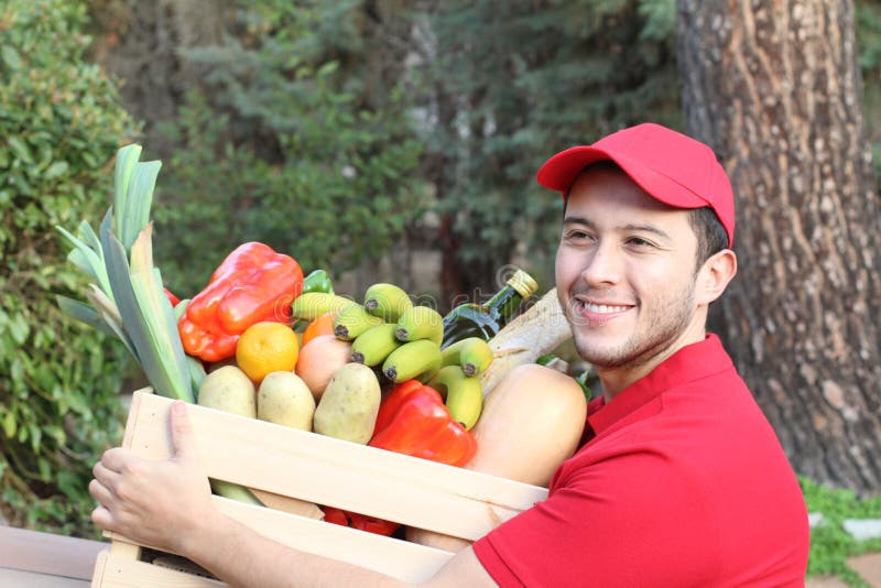 Delivery Man with Red Uniform Stock Photo - Image of meal, male: 212292826