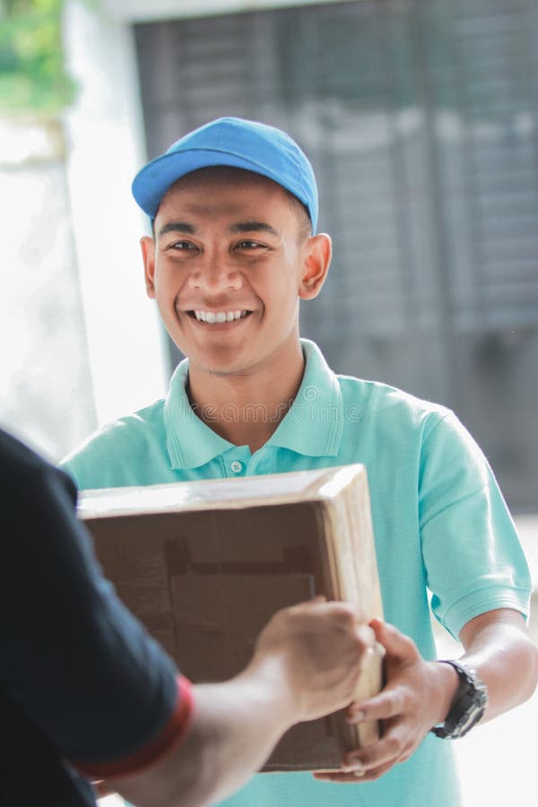 Happy Delivery Man with Package Stock Image - Image of home, customer ...