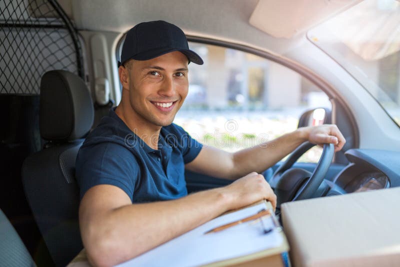 Delivery Man Sitting in a Delivery Van Stock Photo - Image of freight ...