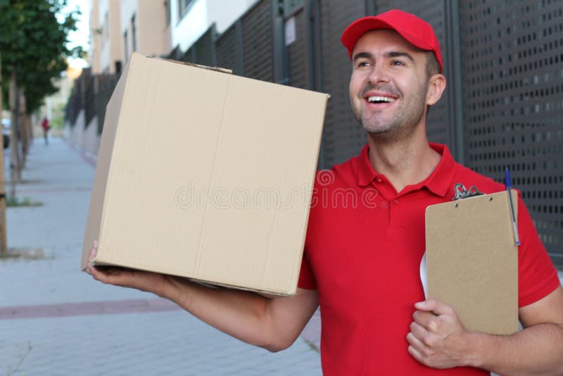 Delivery Man Smiling at Work Stock Photo - Image of cardboard, express ...