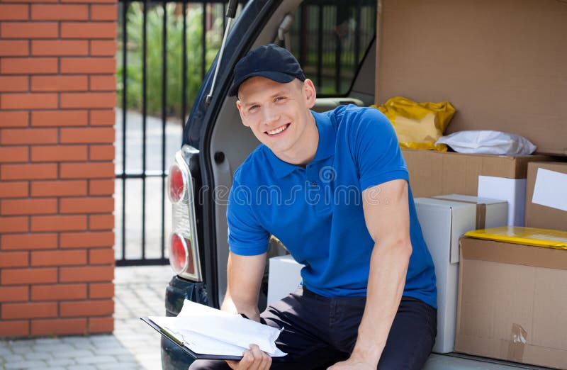 Delivery Man Taking Break from Work Stock Photo - Image of document ... Delivery Man Taking Break from Work Stock Photo - Image of document ...
