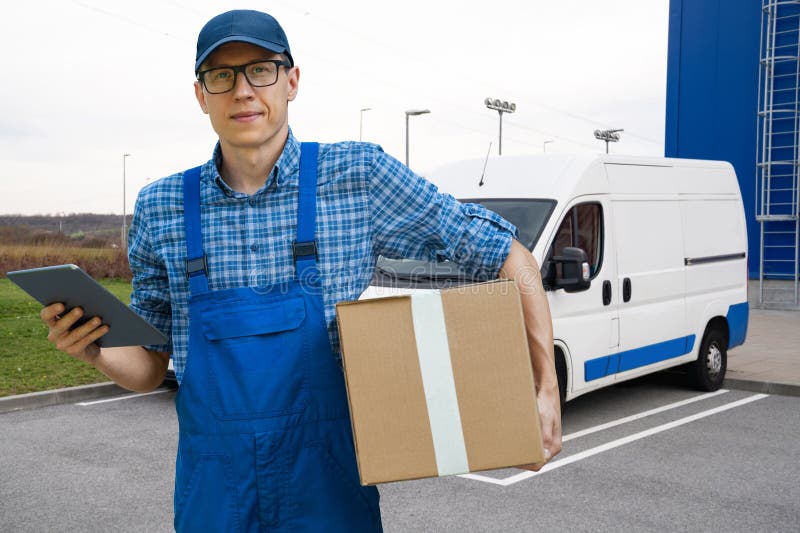 Delivery Man in Uniform with Digital Tablet Stock Image - Image of ...
