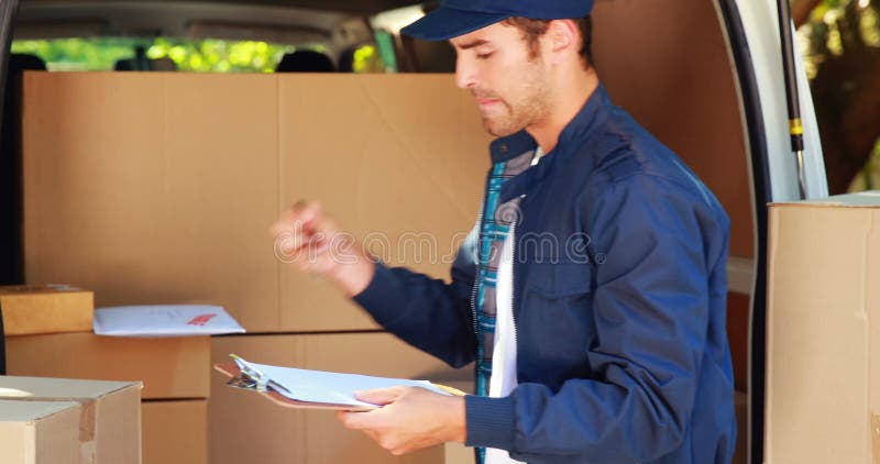 Smiling Delivery Man Sitting in His Van Stock Video - Video of ...