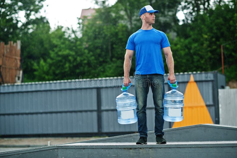Delivery men of water stock photo. Image of career, fresh - 211445068