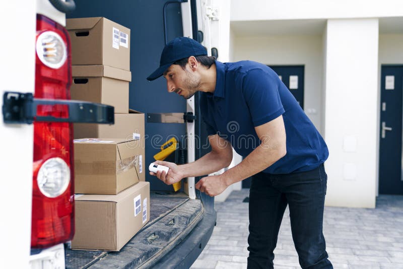Delivery man at work stock image. Image of holding, person - 224811679