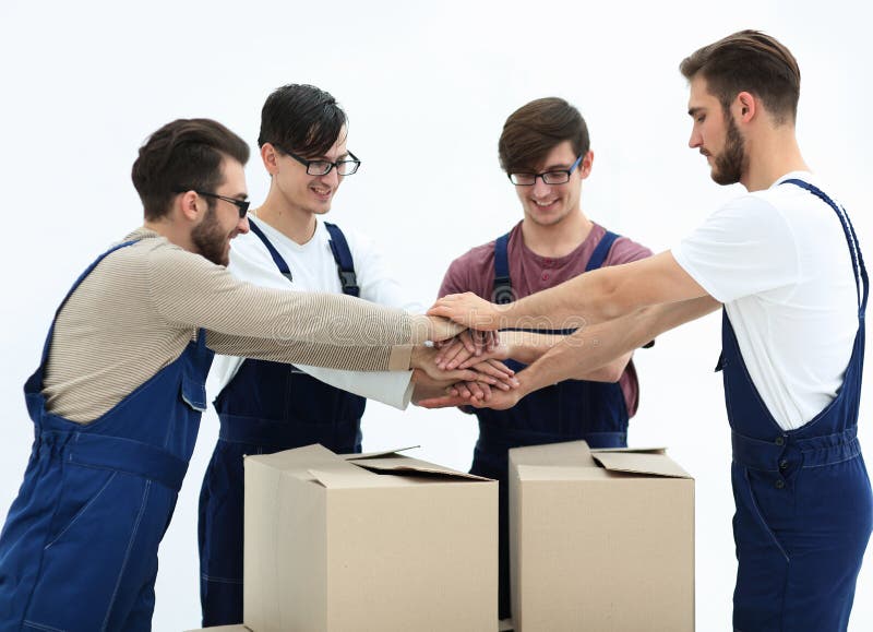 Cheerful Movers Leaning on Stack of Boxes Isolated on White Back Stock ...
