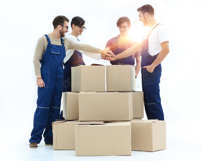 Cheerful Movers Leaning on Stack of Boxes Isolated on White Back Stock ...