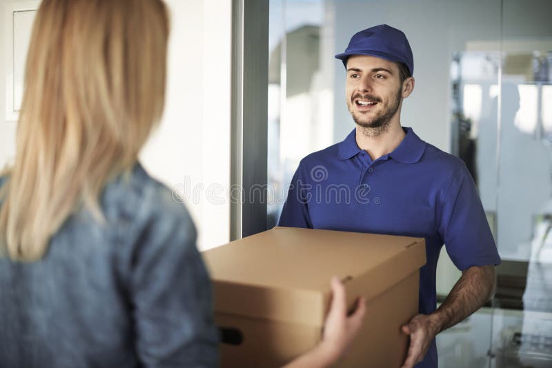 155 Delivery Handing Over Package Stock Photos - Free & Royalty-Free ...