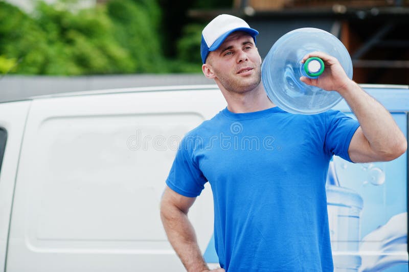 Delivery men of water stock photo. Image of drink, gallon - 211444780