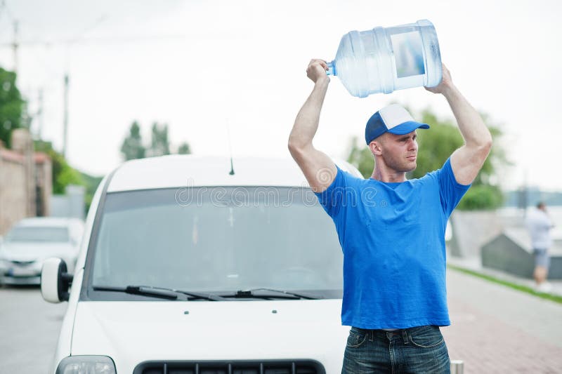 Delivery men of water stock photo. Image of fresh, professional - 211444966