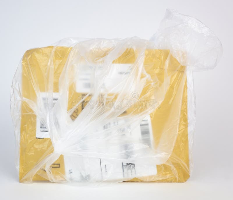 Delivery Parcel Wrapped in Plastic Stock Image - Image of paper ...