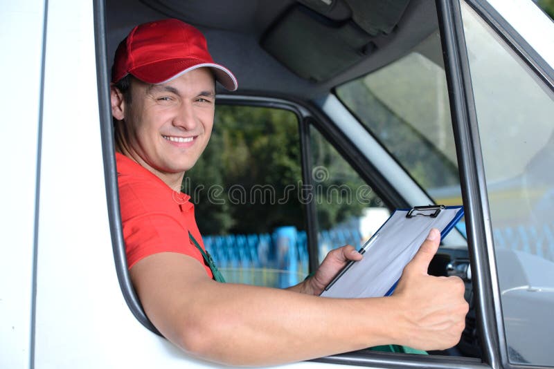 Portrait of Delivery Driver with Flowers Stock Image - Image of ...
