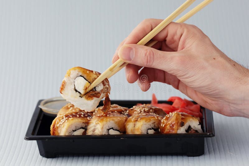 Delivery Service Japanese Food Rolls in Plastic Box Stock Photo - Image ...