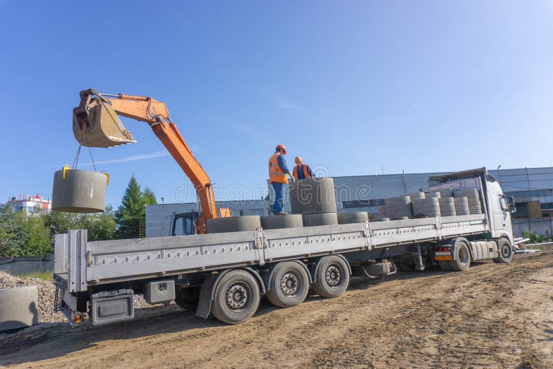 Delivery and Unloading of Construction Materials Editorial Stock Image ...