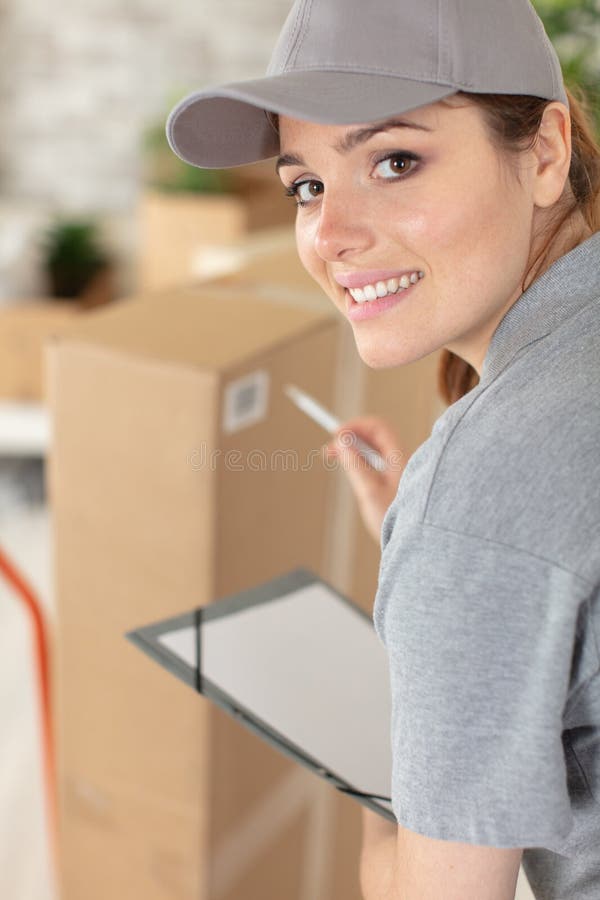 Delivery Woman Smiling Holding Parcel Box Stock Image - Image of ...