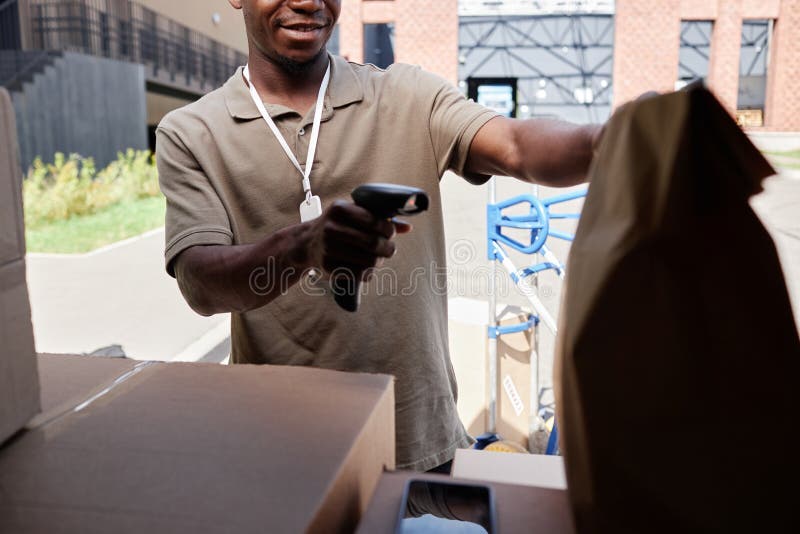 Delivery Worker Scanning Packages Stock Image - Image of load ...