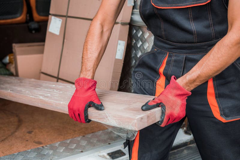 Delivery Worker Unloading Packages from Cargo Vehicle Efficiently Stock ...