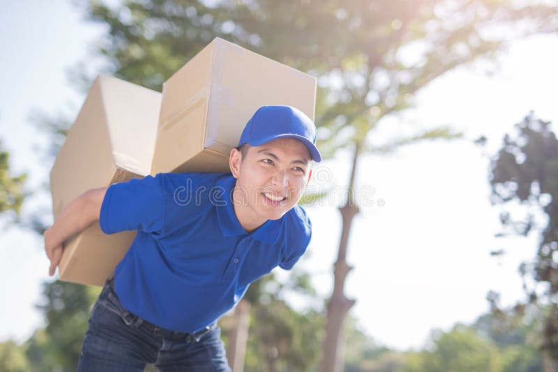 Deliveryman hold heavy box stock image. Image of athletic - 85875523