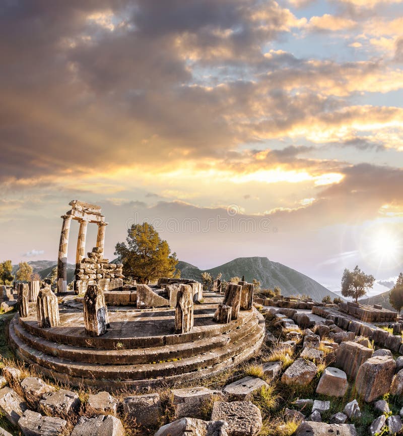 Delphi with Ruins of the Temple Against Sunset in Greece Stock Photo ...