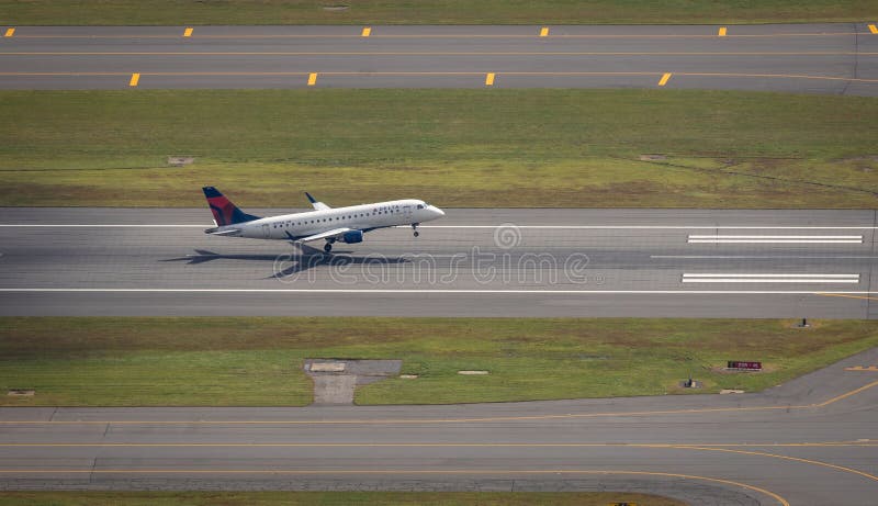 Delta Jet Takeoff with Shadow on Runway Editorial Stock Photo - Image ...