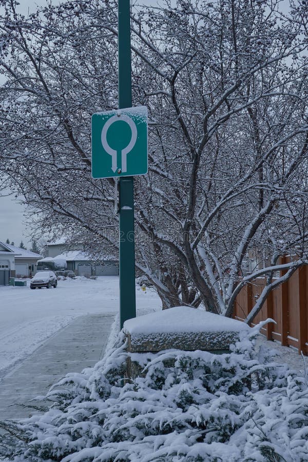 Winter Traffic Control: Road Signs in the Snow. Stock Photo - Image of ...