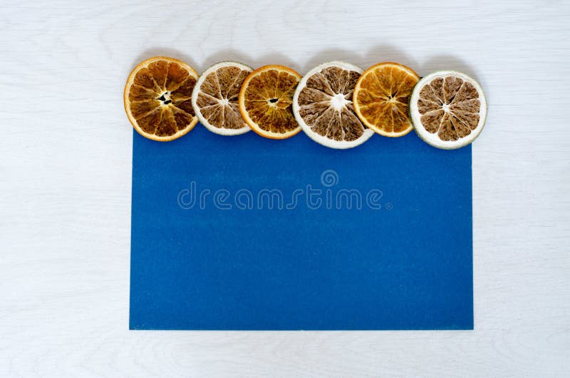 Blue Rectangle on a White Background Decorated with Dry Citruses Stock ...