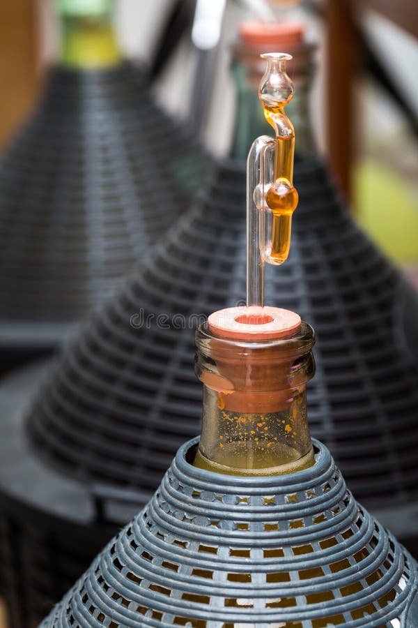 Demijohn with Glass Fermentation Lock. Stock Image - Image of closeup ...