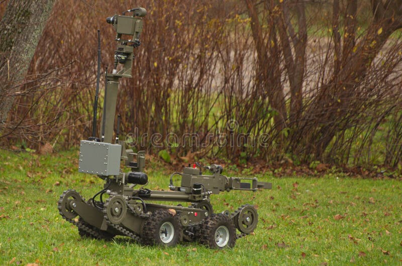 The Demining Robot is Driving through the Grass Stock Image - Image of ...