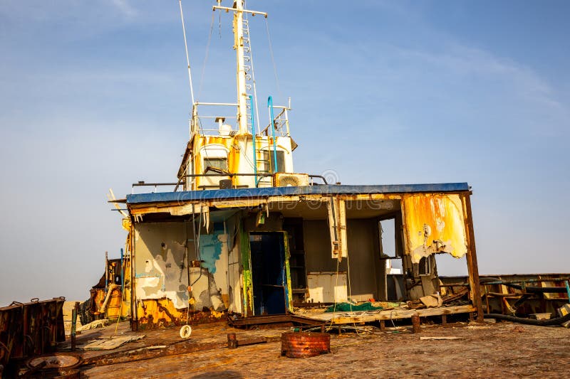 Demolished and Rusty Deck of a Cargo Ship with Old Bridge, Mast ...