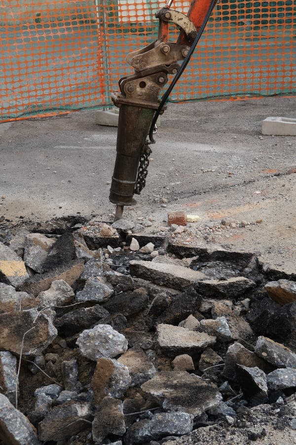 Demolition of the Asphalt of a Road with a Jackhammer Stock Photo ...