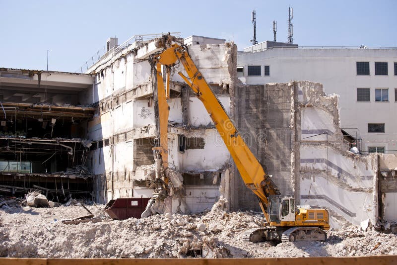 Demolition of Building. Excavator Breaks Old House Stock Image - Image ...