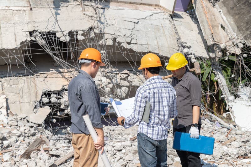 Demolition Control Supervisor and Contractor Discussing on Demolish ...