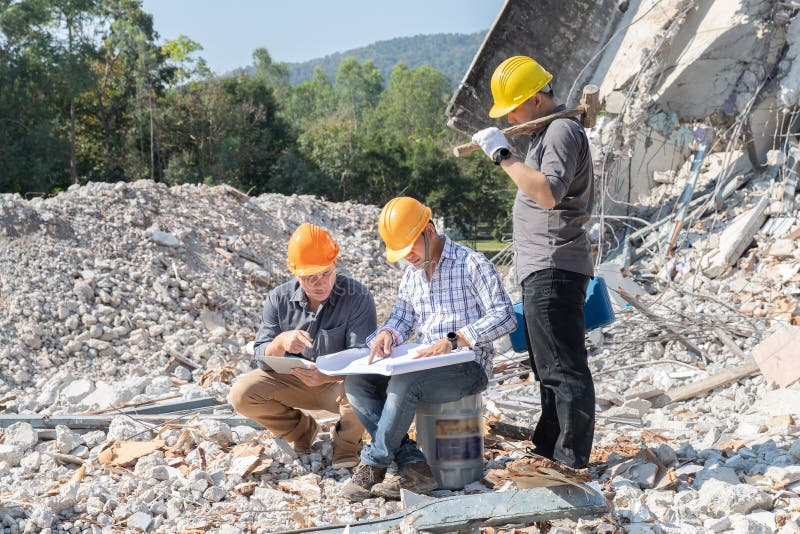 Demolition Control Supervisor and Contractor Discussing on Demolish ...
