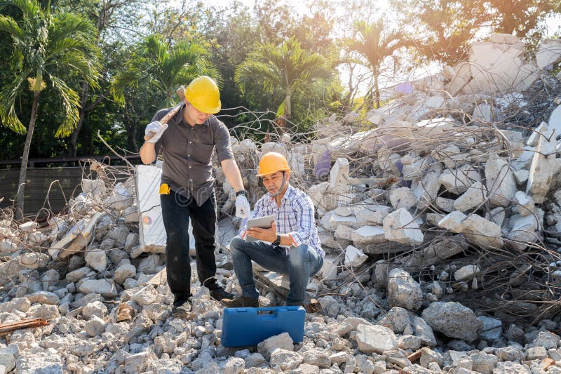 Demolition Control Supervisor and Contractor Discussing on Demolish ...
