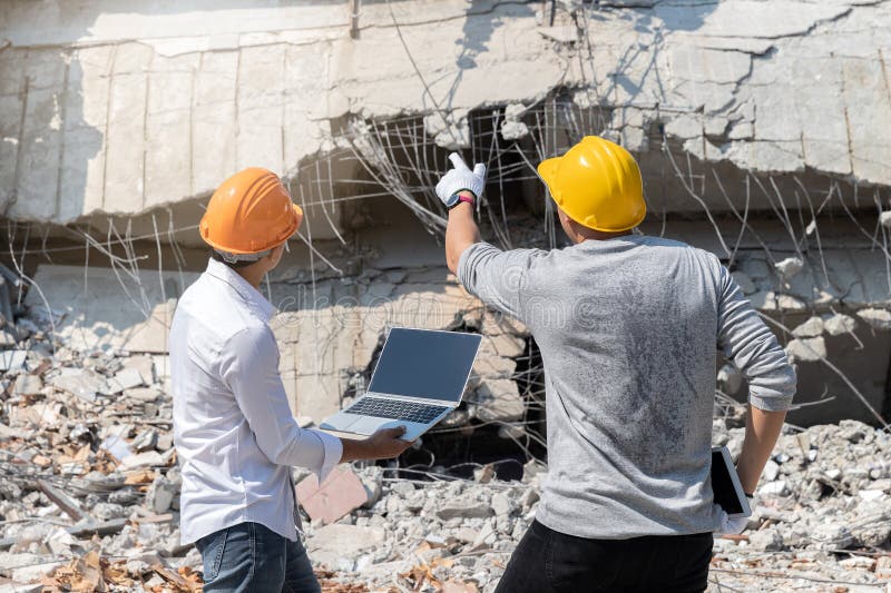 Demolition Control Supervisor and Contractor Discussing on Demolish ...