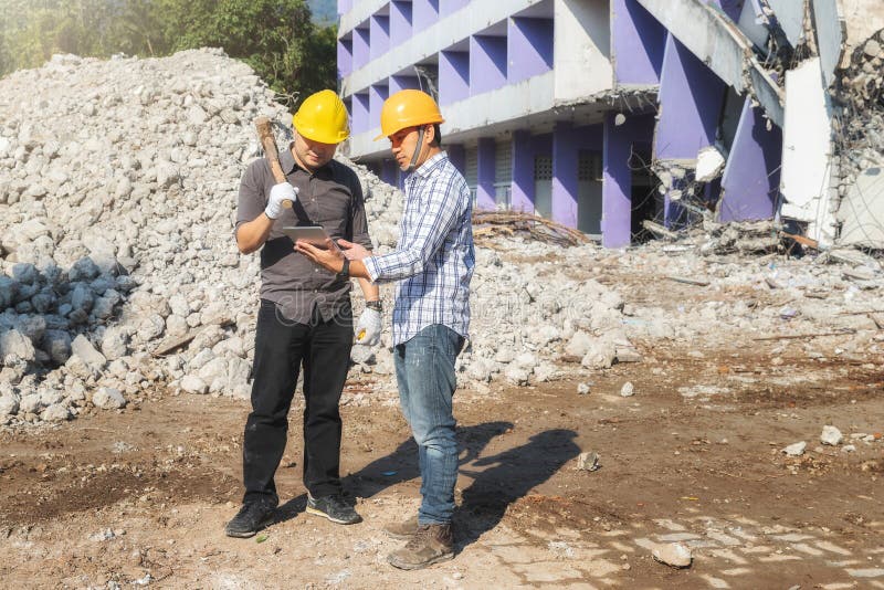 Demolition Control Supervisor and Contractor Discussing on Demolish ...