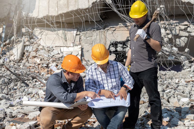 Demolition Control Supervisor and Contractor Discussing on Demolish ...