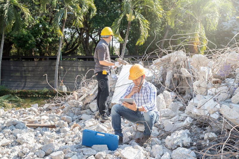 Demolition Control Supervisor and Contractor Working on Demolish ...
