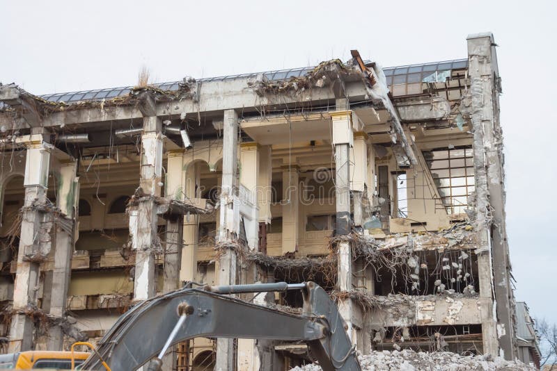 Demolition and Destruction of a Building Using Excavator. Destroyers ...